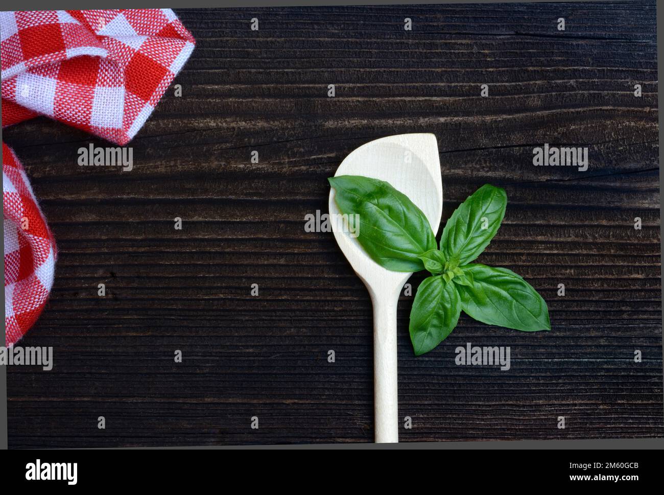 Cooking spoon and basil (Ocimum basilicum Stock Photo - Alamy