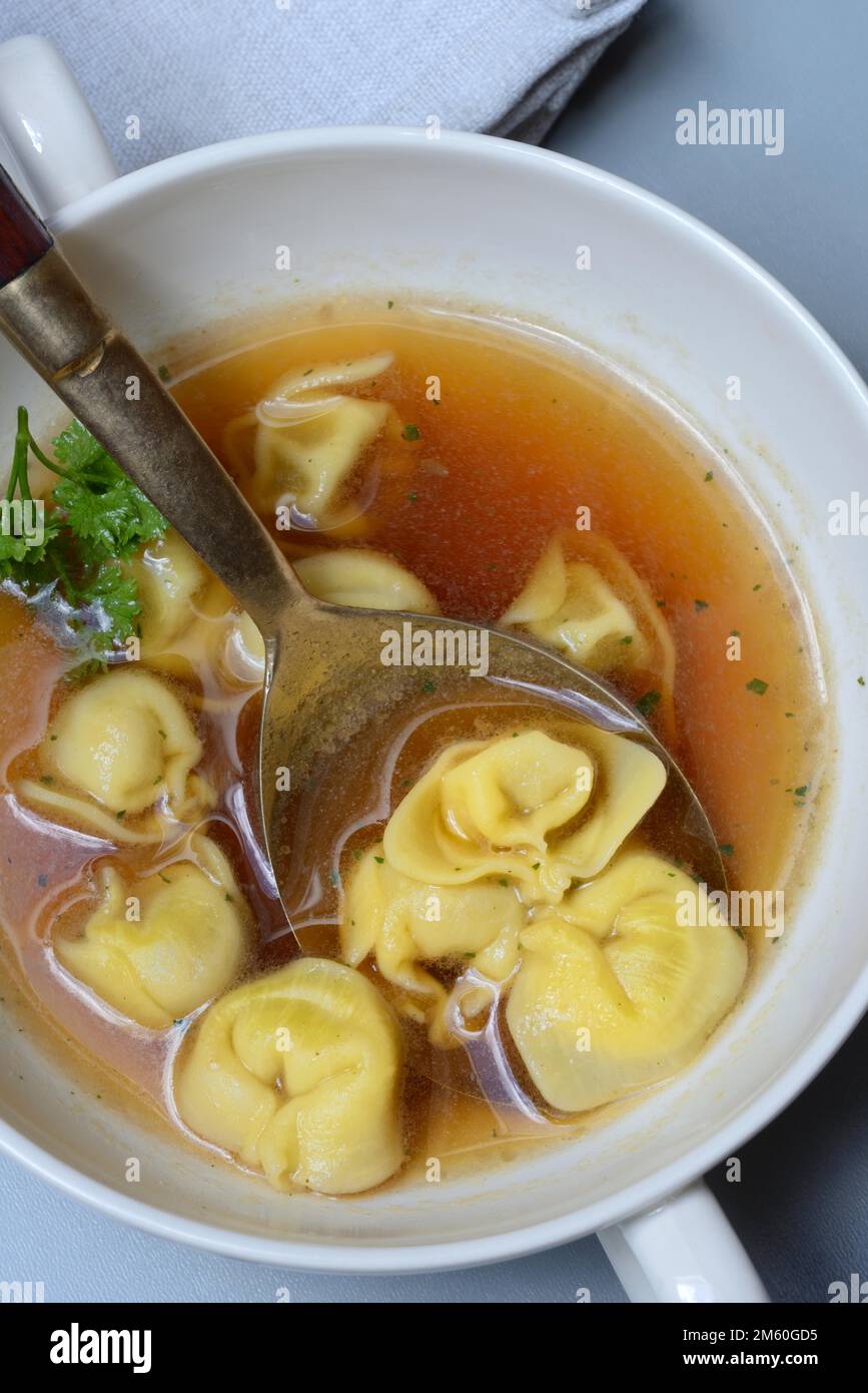 Cappelletti, pasta with broth in shell, pasta Stock Photo - Alamy