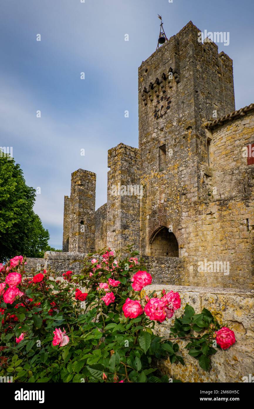 View on the gate of the fortified medieval village of Larressingle in ...