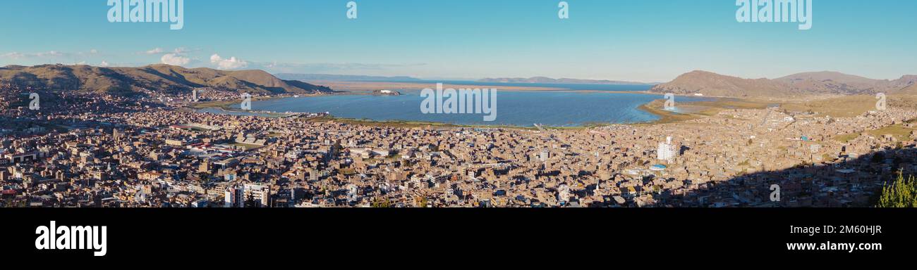 A panoramic shot of the Puno city on the coast of a sea in Peru Stock ...