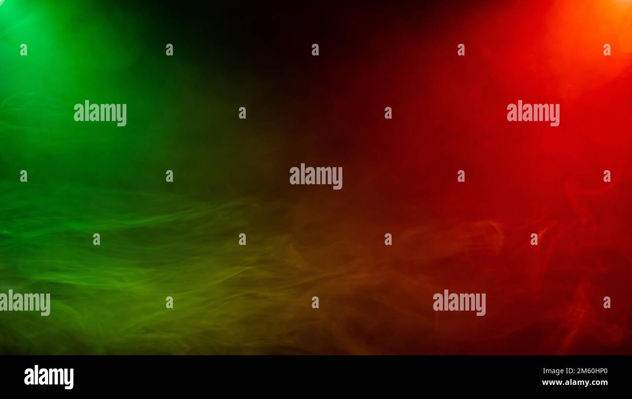 Red yellow green smoke on a black background Stock Photo - Alamy