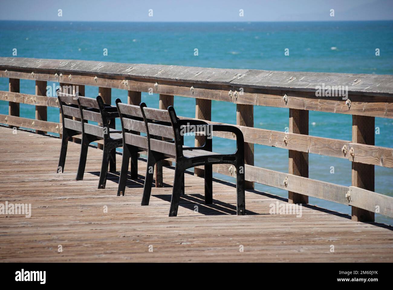 Benches in front of the ocean at Ventura Pier, California, USA Stock ...