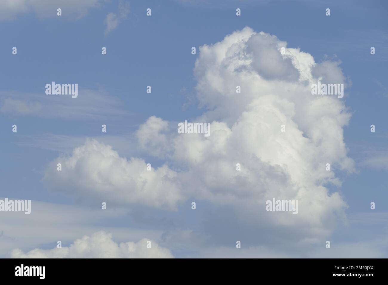 White spring clouds, blue sky, Germany Stock Photo - Alamy