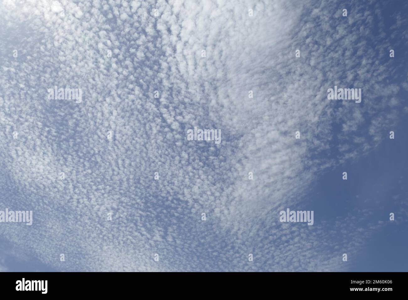 White spring clouds, blue sky, Germany Stock Photo - Alamy