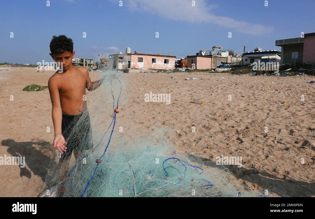 A child work in Jal El Bahar Palestinian Refugees camp, Tyr, Lebanon ...