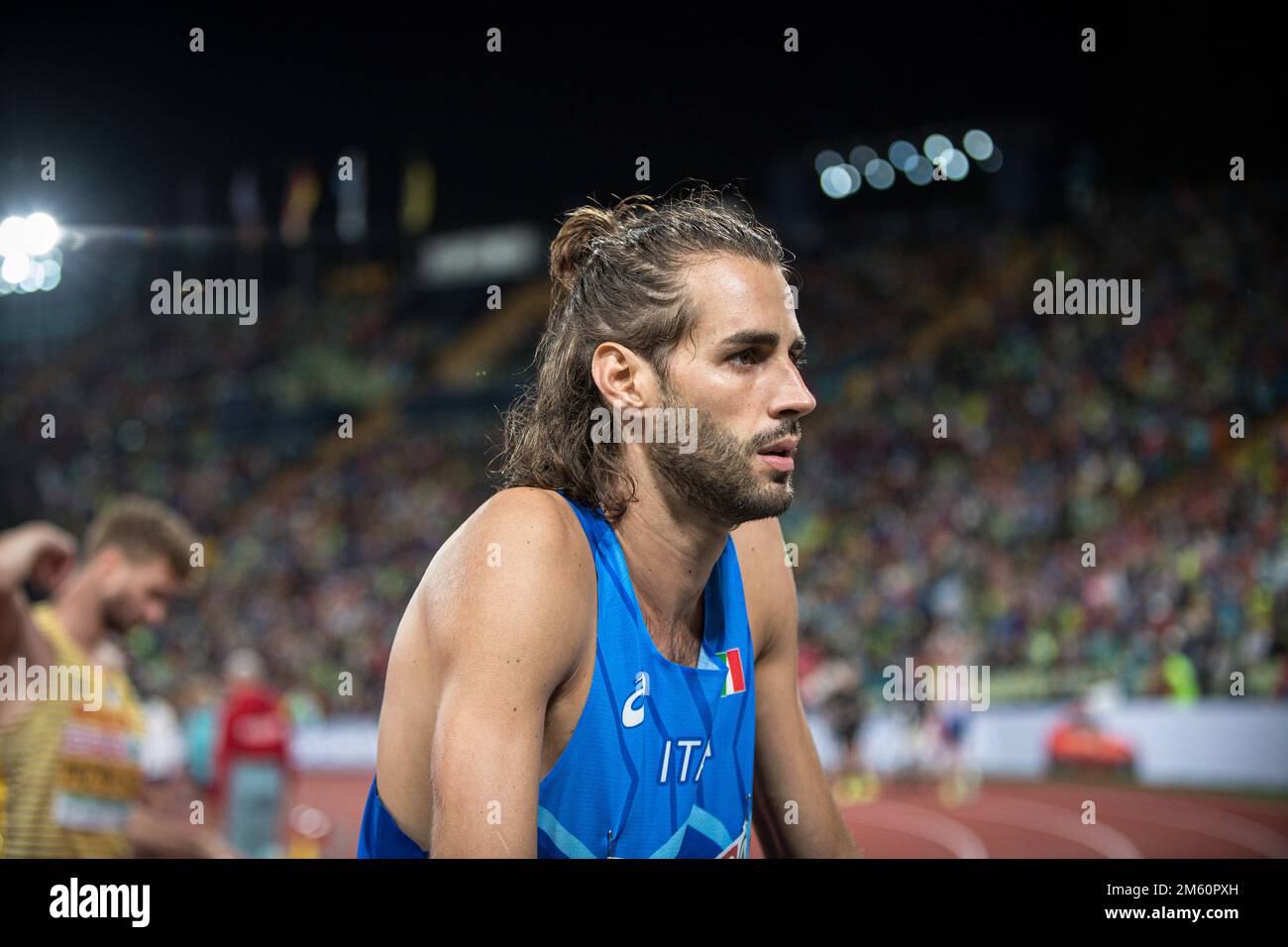 Gianmarco Tamberi participating in the high jump at the 2022 European ...