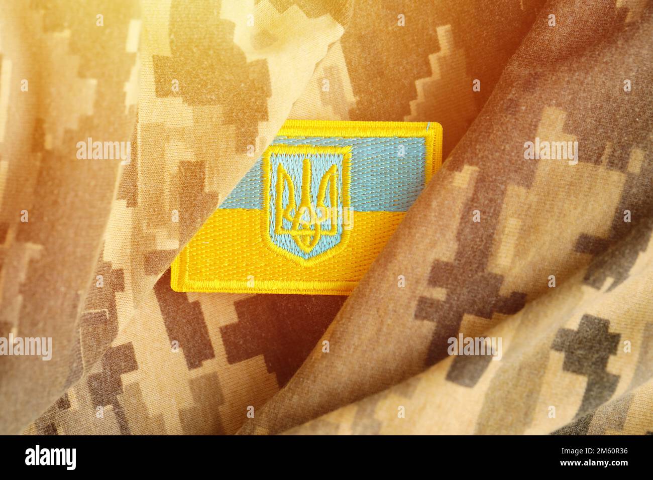 Pixeled digital military camouflage fabric with ukrainian flag and coat ...