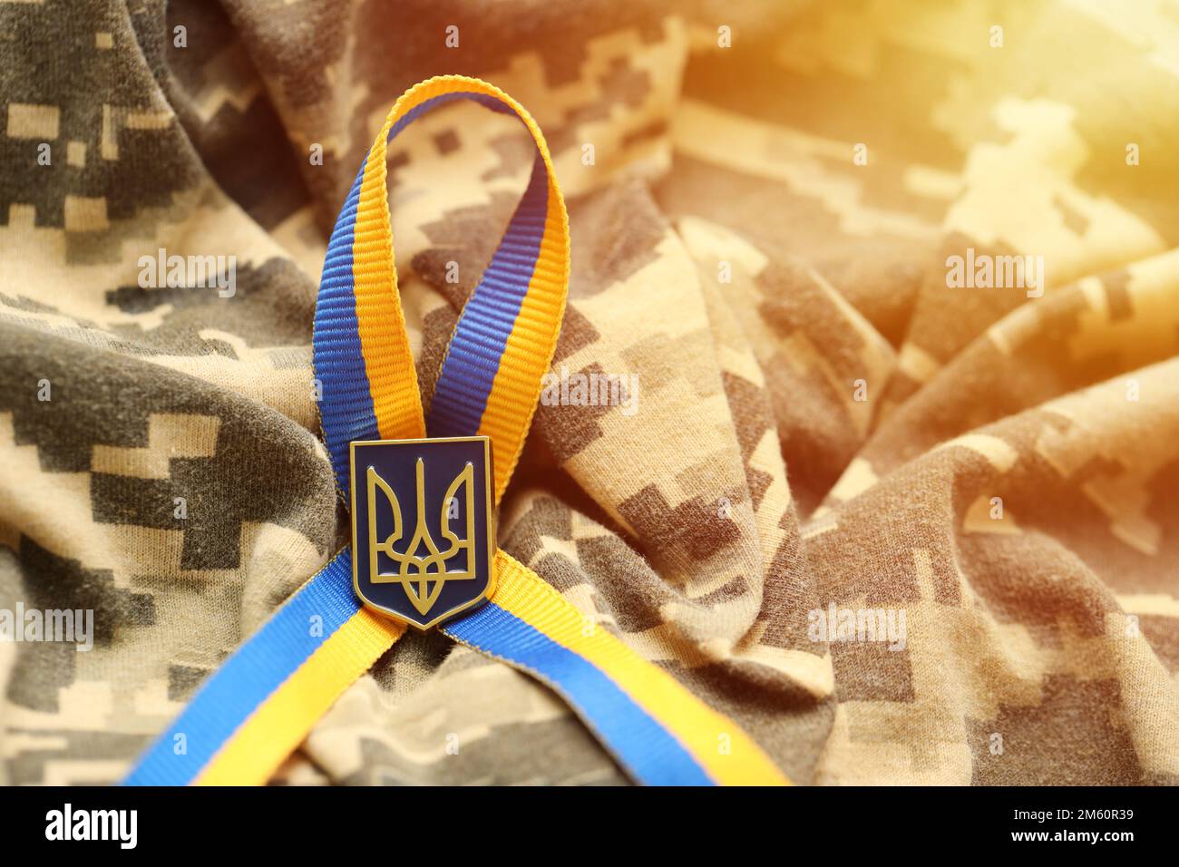 Pixeled digital military camouflage fabric with ukrainian flag and coat ...