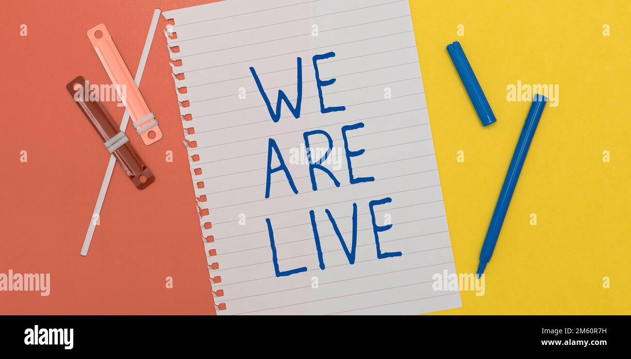 Text caption presenting We Are Live. Conceptual photo continuous report ...