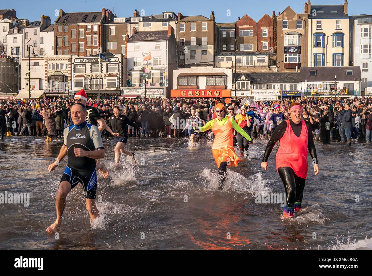 People take part in the Scarborough Lions New Year's Day Dip on ...