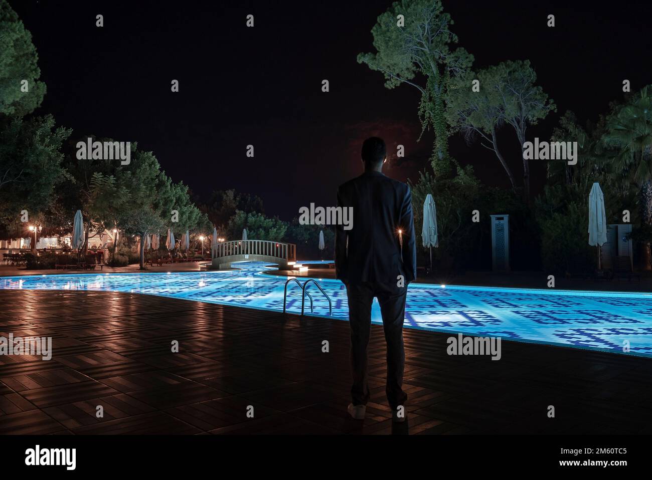Wearing suit at pool hi-res stock photography and images - Alamy