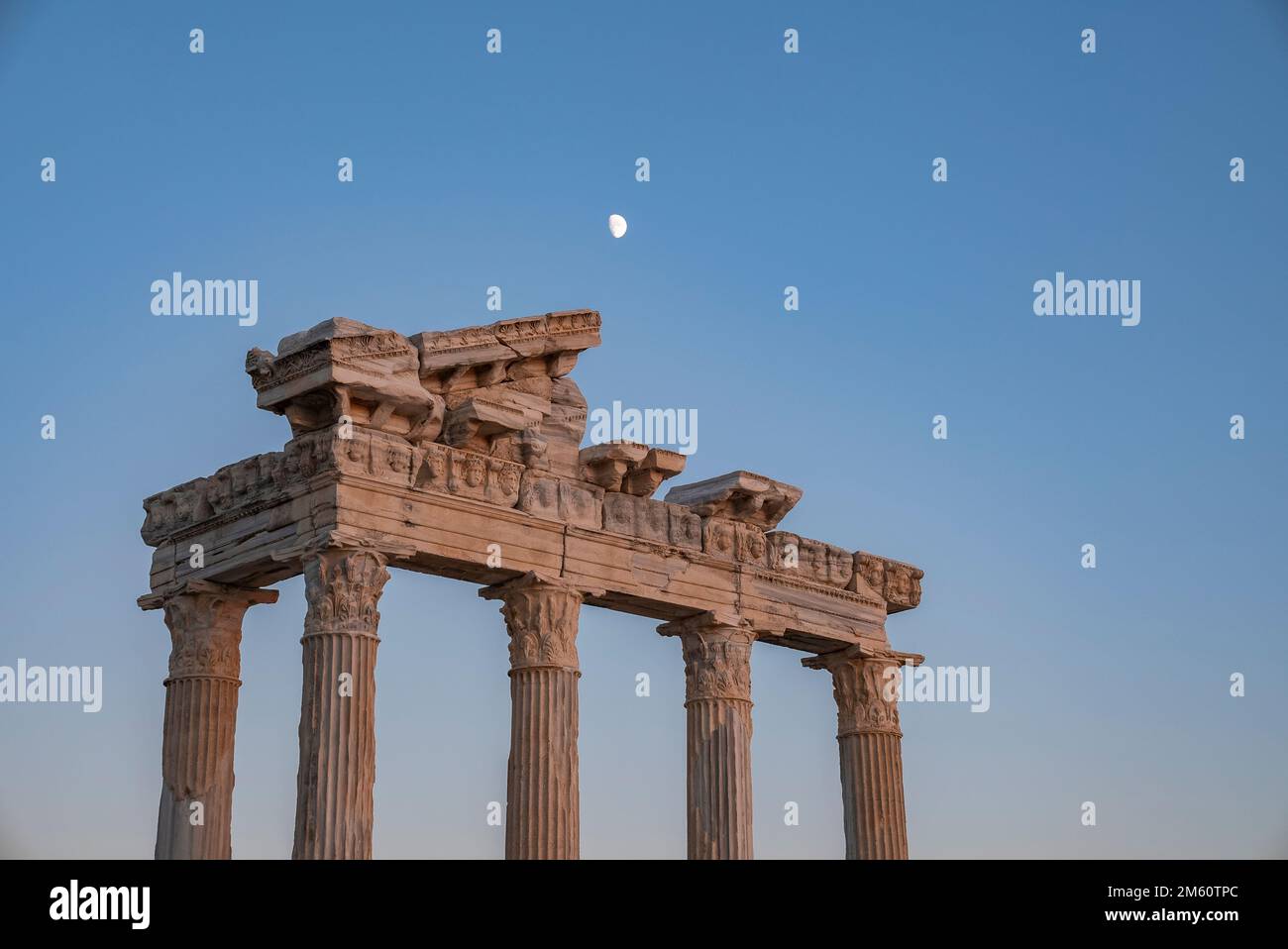 Roman Temple of Apollo under clear blue sky at dusk in Side, Turkey ...