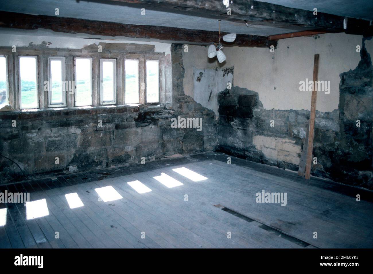17th century stone farmhouse with mullion window being restored in 1983 ...
