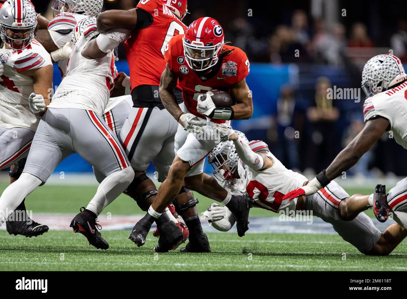 December 31, 2022: Georgia running back Kendall Milton (2) runs with ...