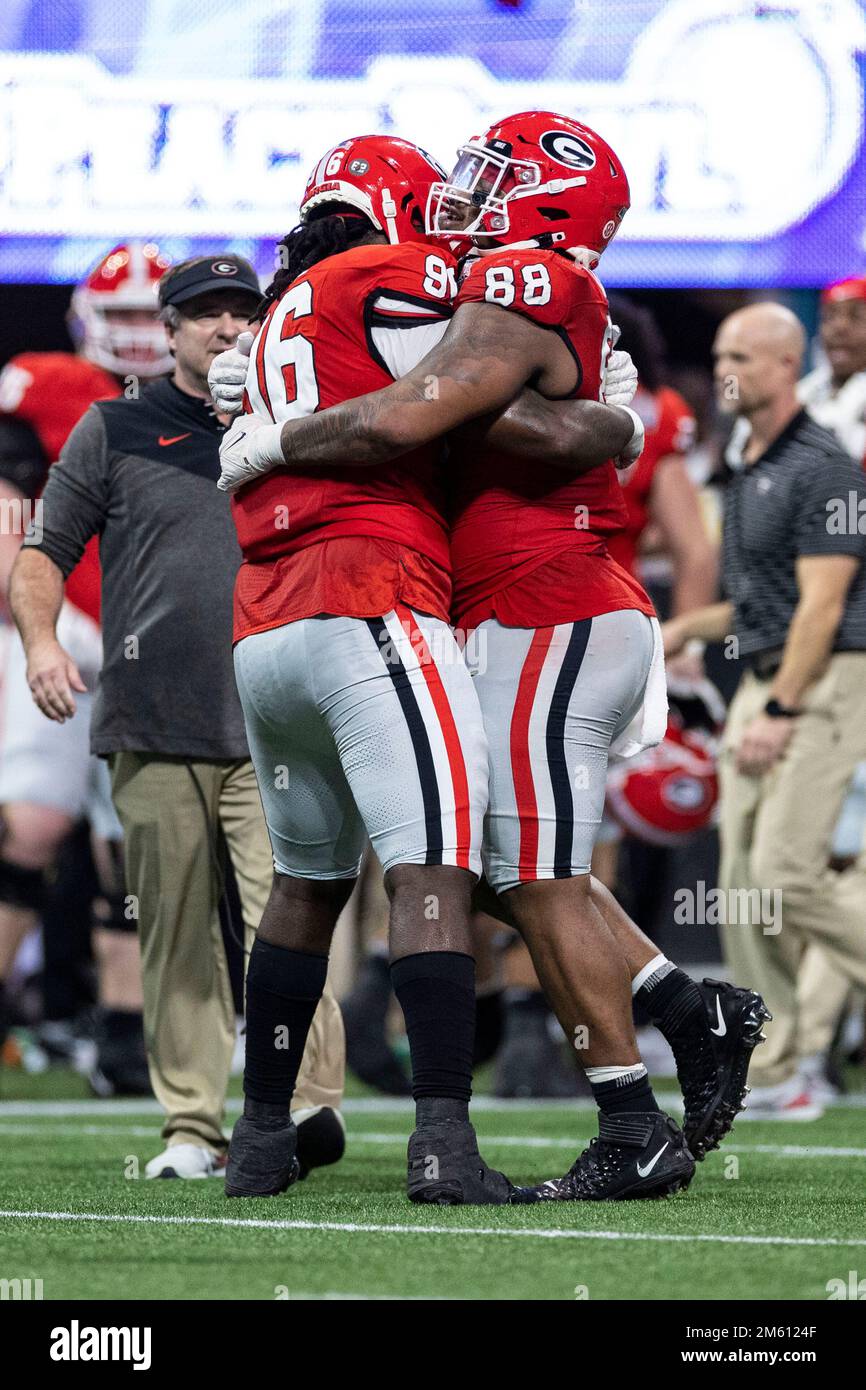 December 31, 2022: Georgia defensive lineman Zion Logue (96) and ...