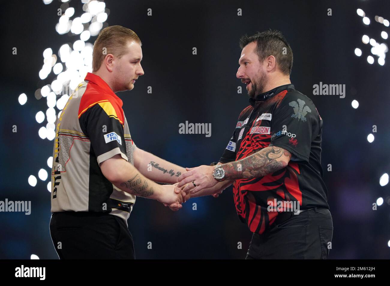Dimitri Van den Bergh celebrates victory over Jonny Clayton during day ...