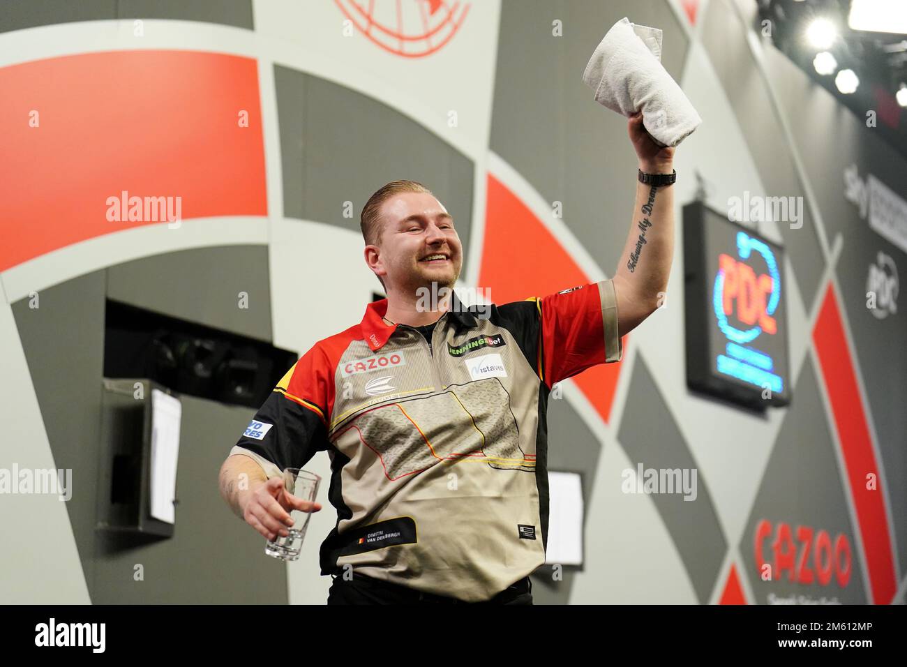 Dimitri Van den Bergh celebrates victory over Jonny Clayton during day ...