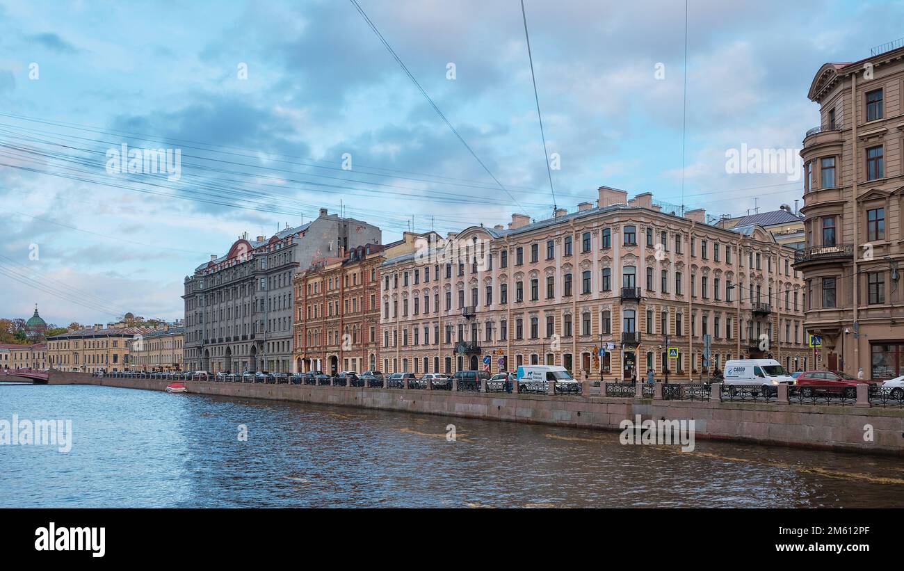 Evening cityscape with a view of the old houses on the Moika river ...