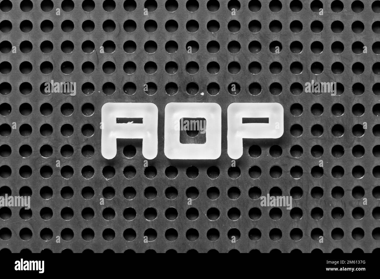 White alphabet letter in word AOP (abbreviation of Annual Operating ...