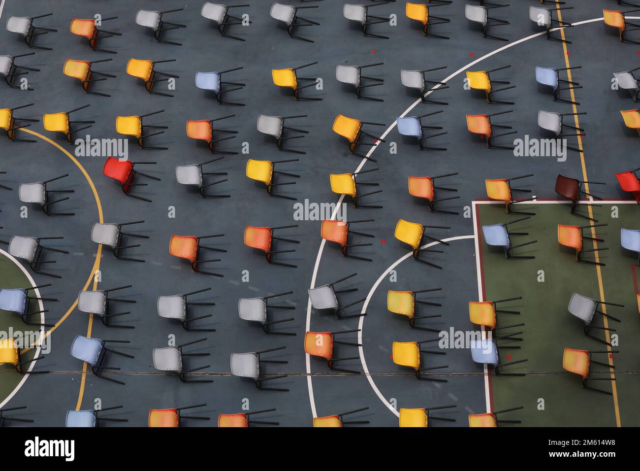 Overturned chairs at a basketball court at a School in Yau Tong ...
