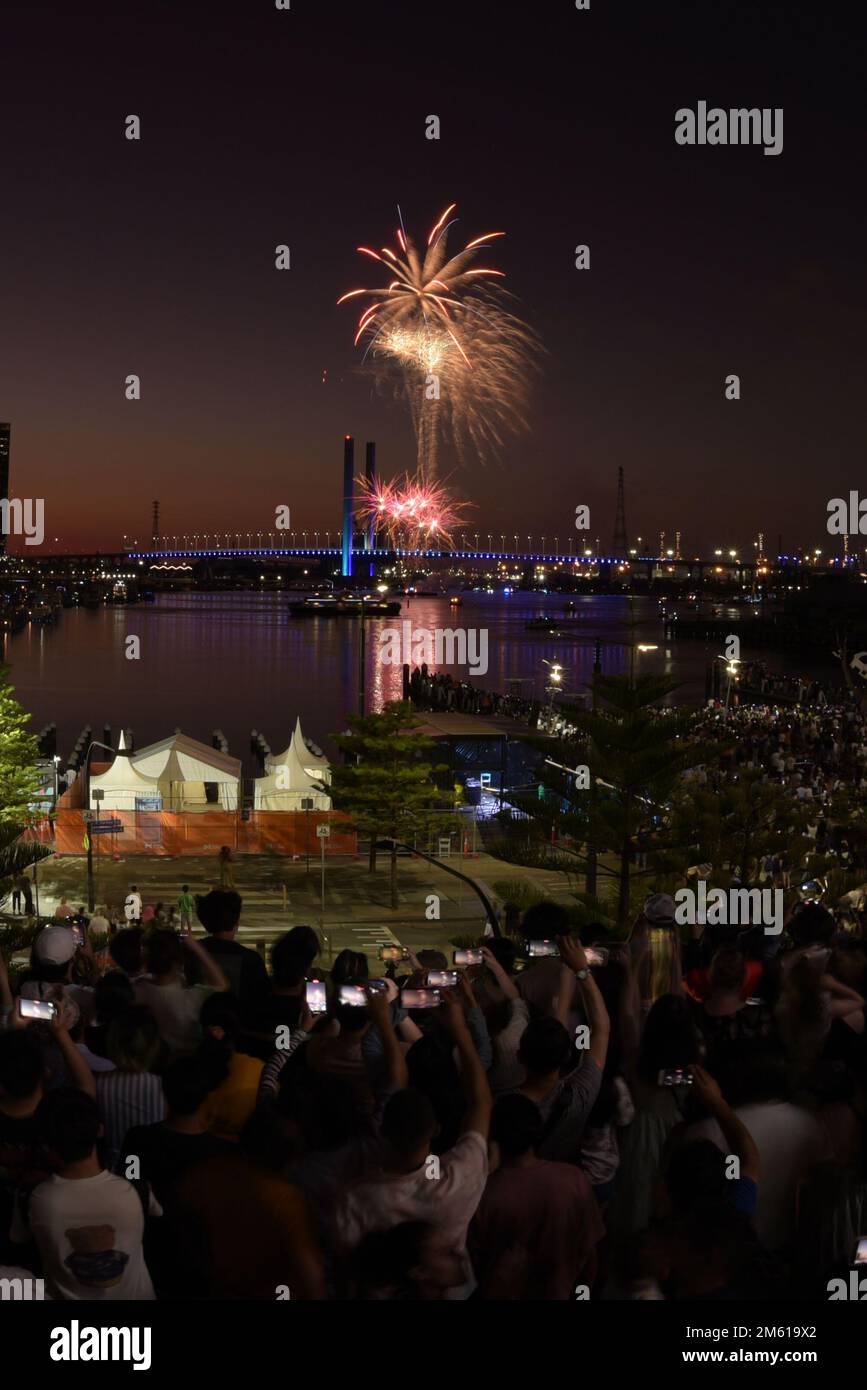 A large number of people watching fireworks at Dockland Marvel Stadium ...