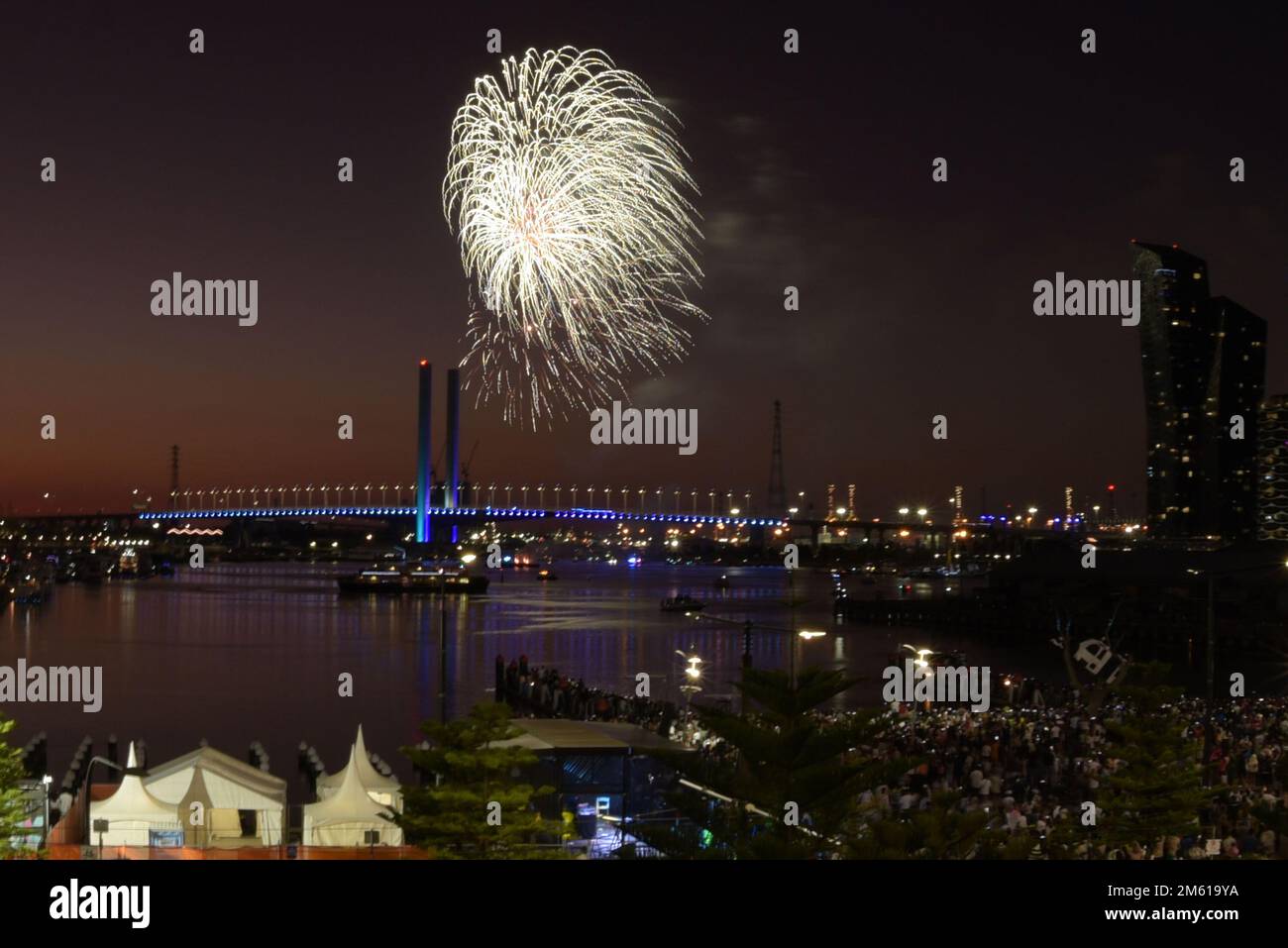 A large number of people watching fireworks at Dockland Marvel Stadium ...