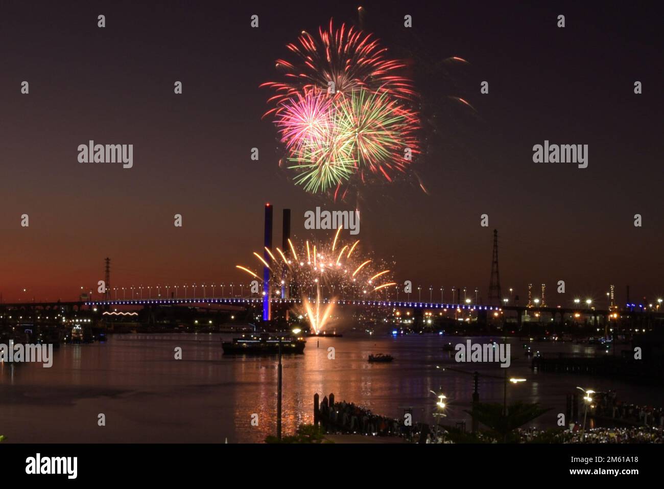 A large number of people watching fireworks at Dockland Marvel Stadium ...