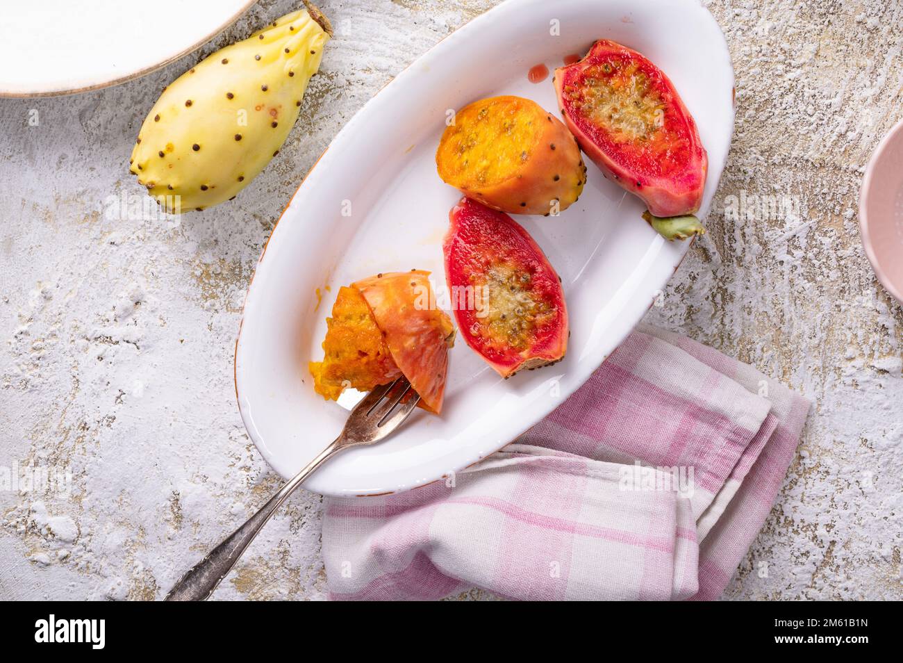Colorful prickly pears on oval plate Stock Photo - Alamy