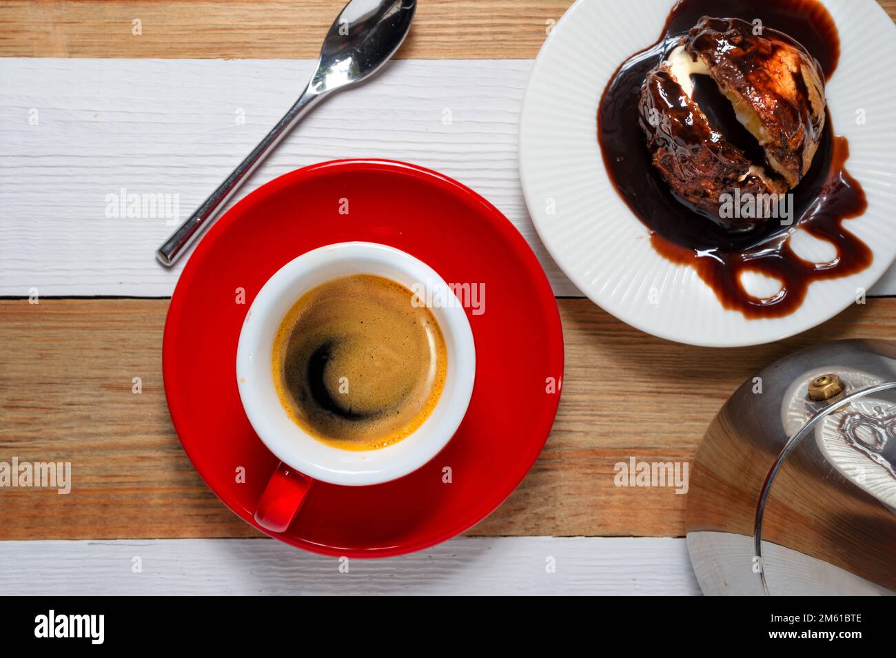 Profiteroles and espresso a top view shot Stock Photo - Alamy