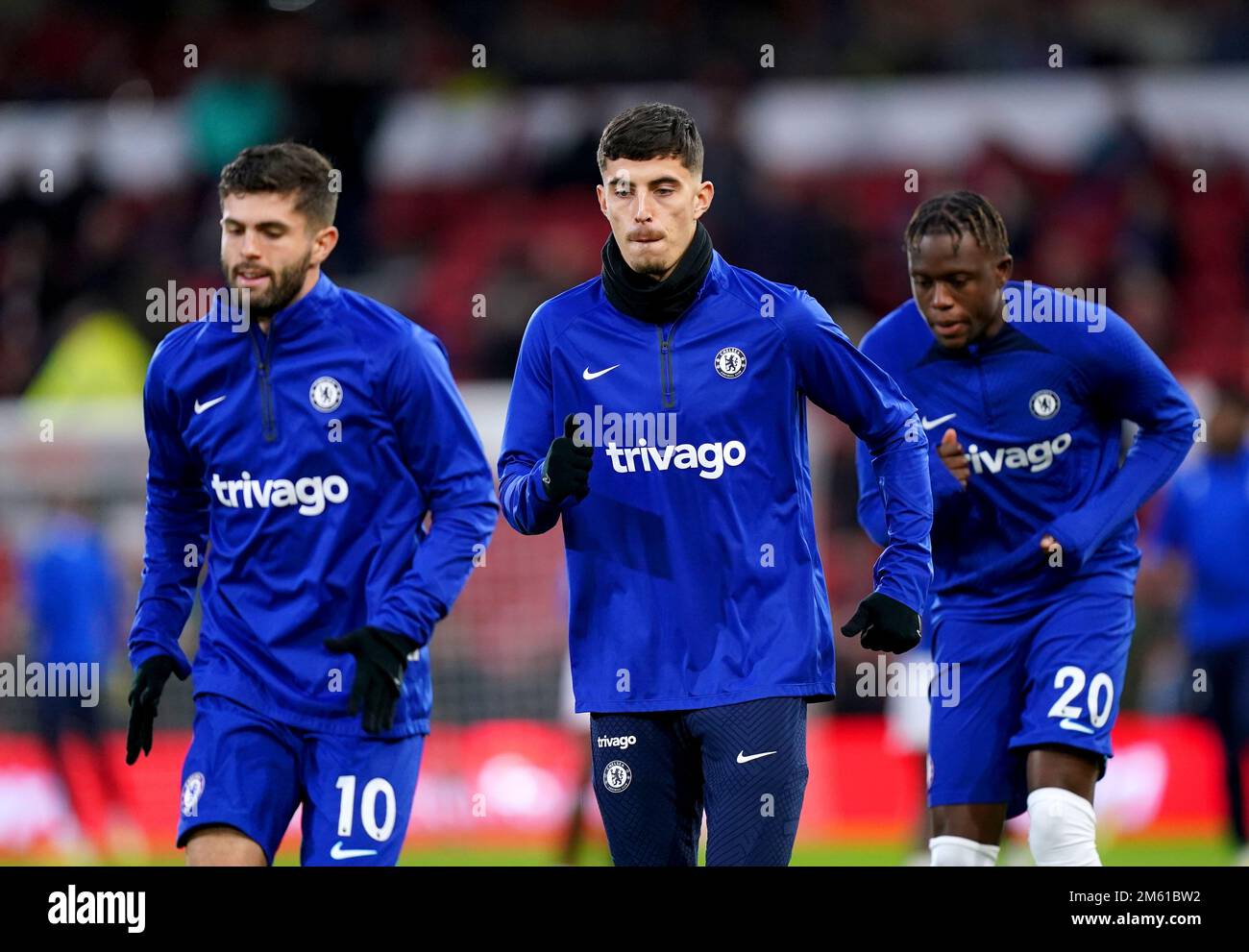 Chelsea's Kai Havertz (centre) warms up on the pitch ahead of the ...