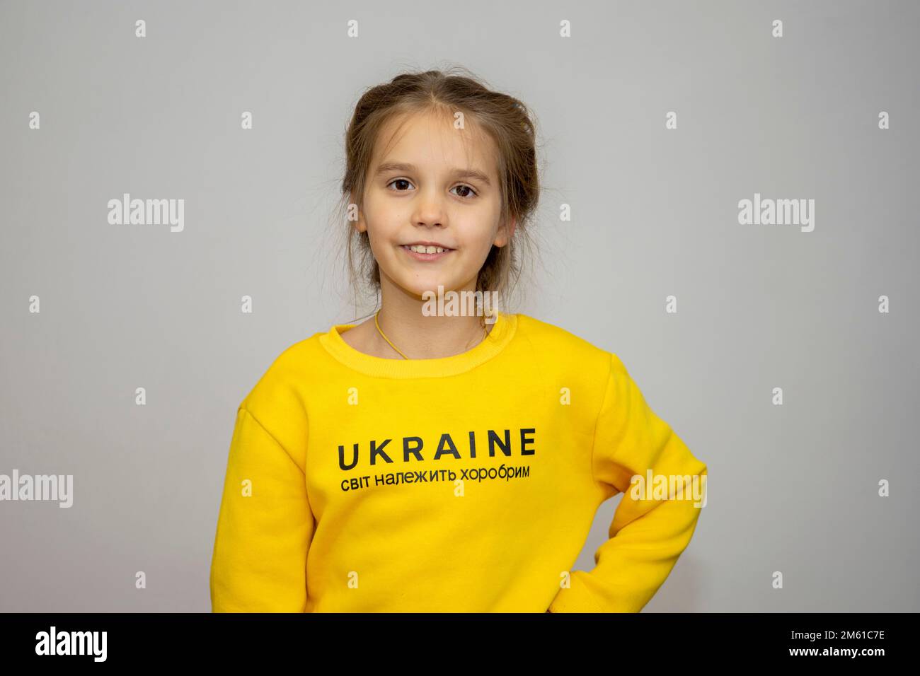 Photo of a Ukrainian girl. The inscription "the world belongs to the ...