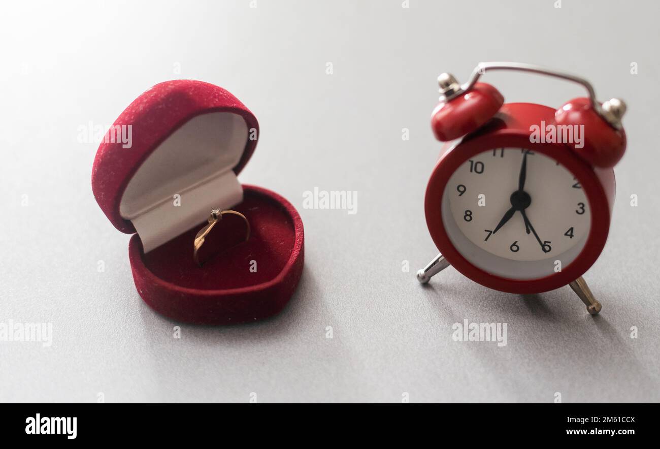 Wedding rings alarm clock hi-res stock photography and images - Alamy