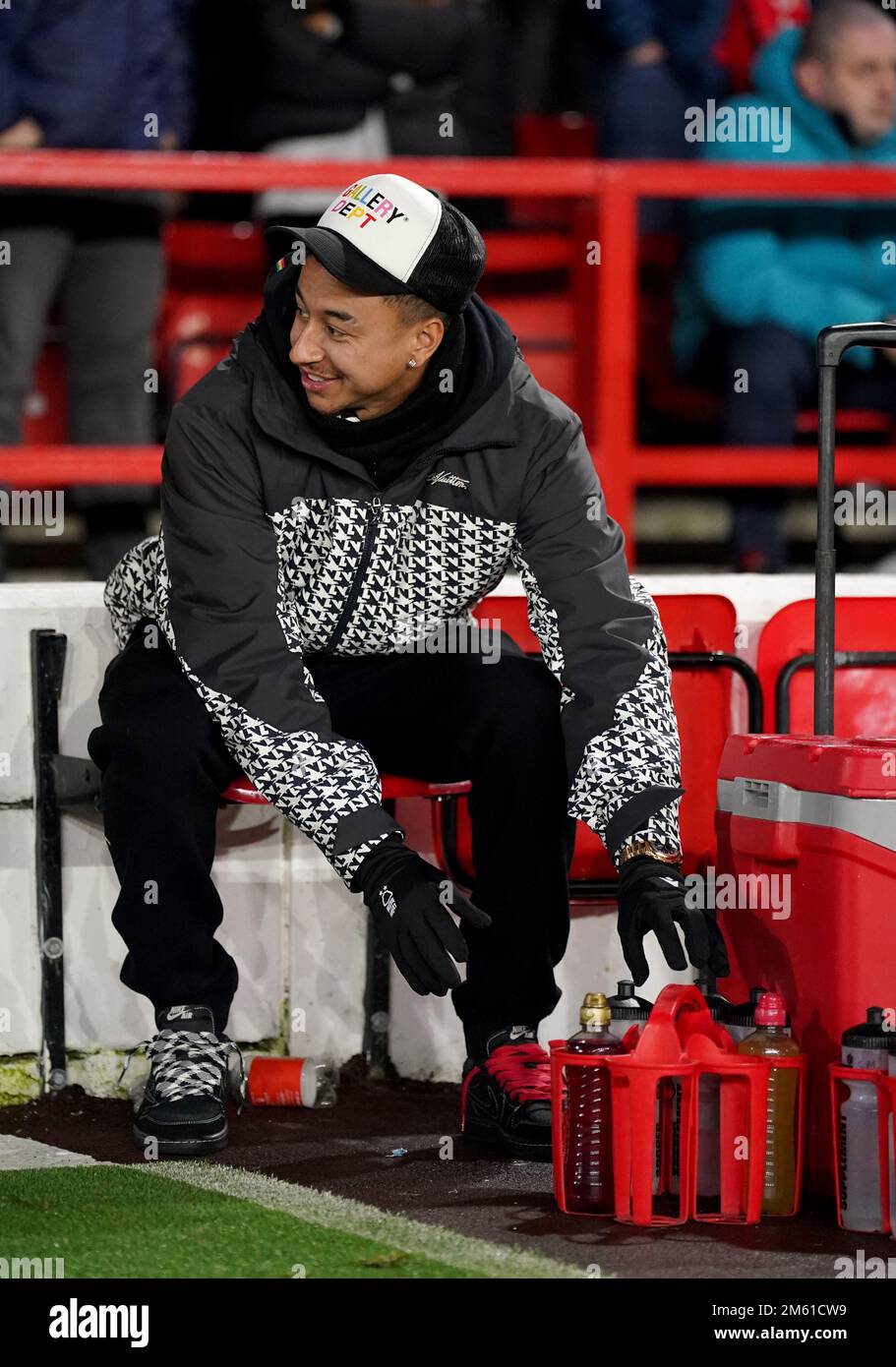 Nottingham Forest's Jesse Lingard offers water bottles to the ...