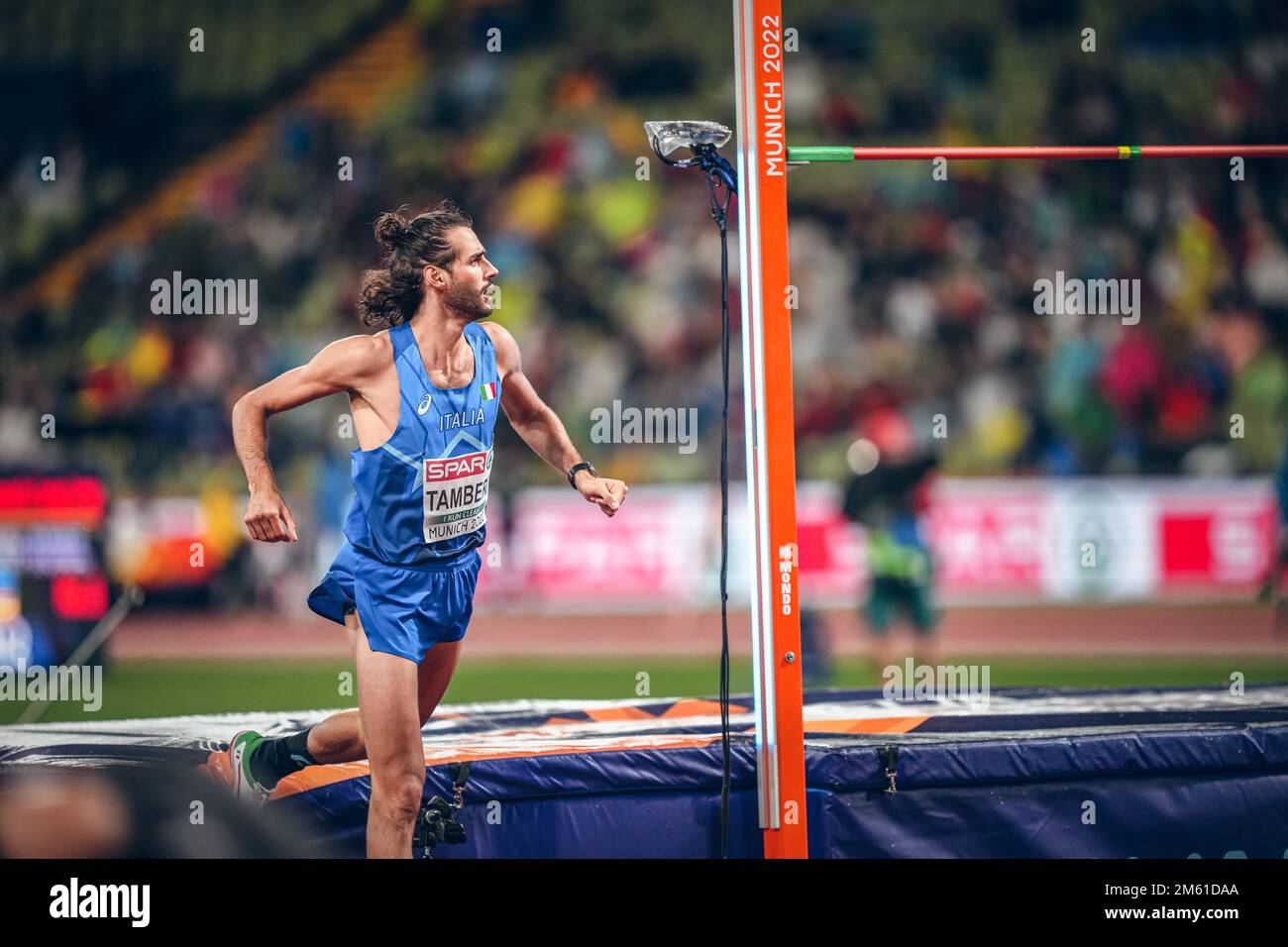 Gianmarco Tamberi participating in the high jump at the 2022 European ...