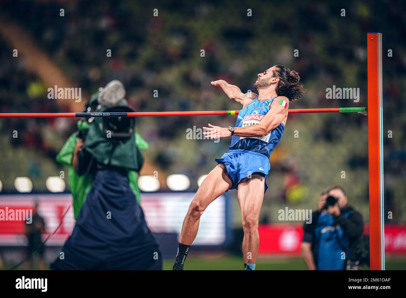 Gianmarco Tamberi participating in the high jump at the 2022 European ...