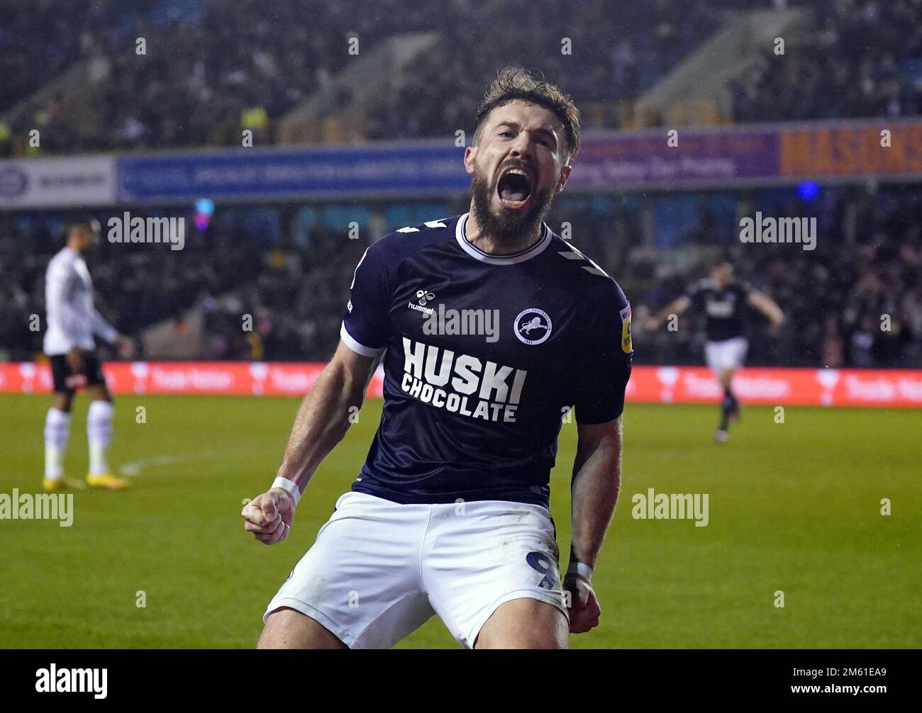 Millwall's Tom Bradshaw celebrates scoring their side's third goal of ...