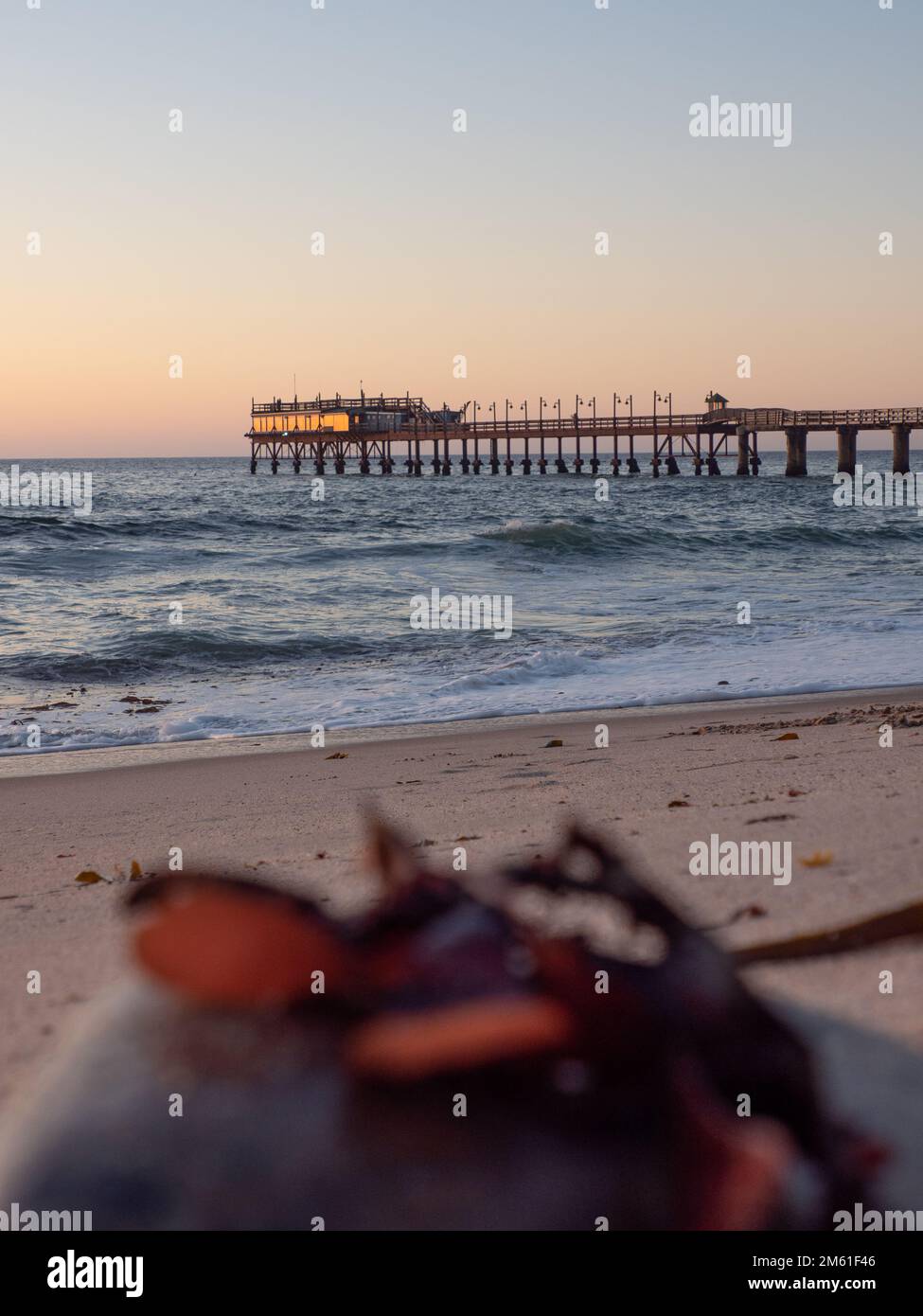 Jetty at the beach in Swakopmund, a coastal town in Namibia Stock Photo ...