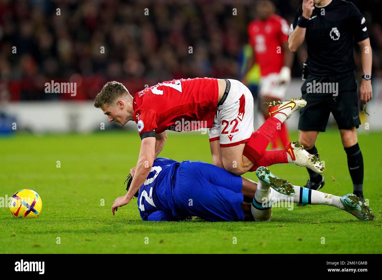 Nottingham Forest's Ryan Yates (top) and Chelsea's Denis Zakaria go ...