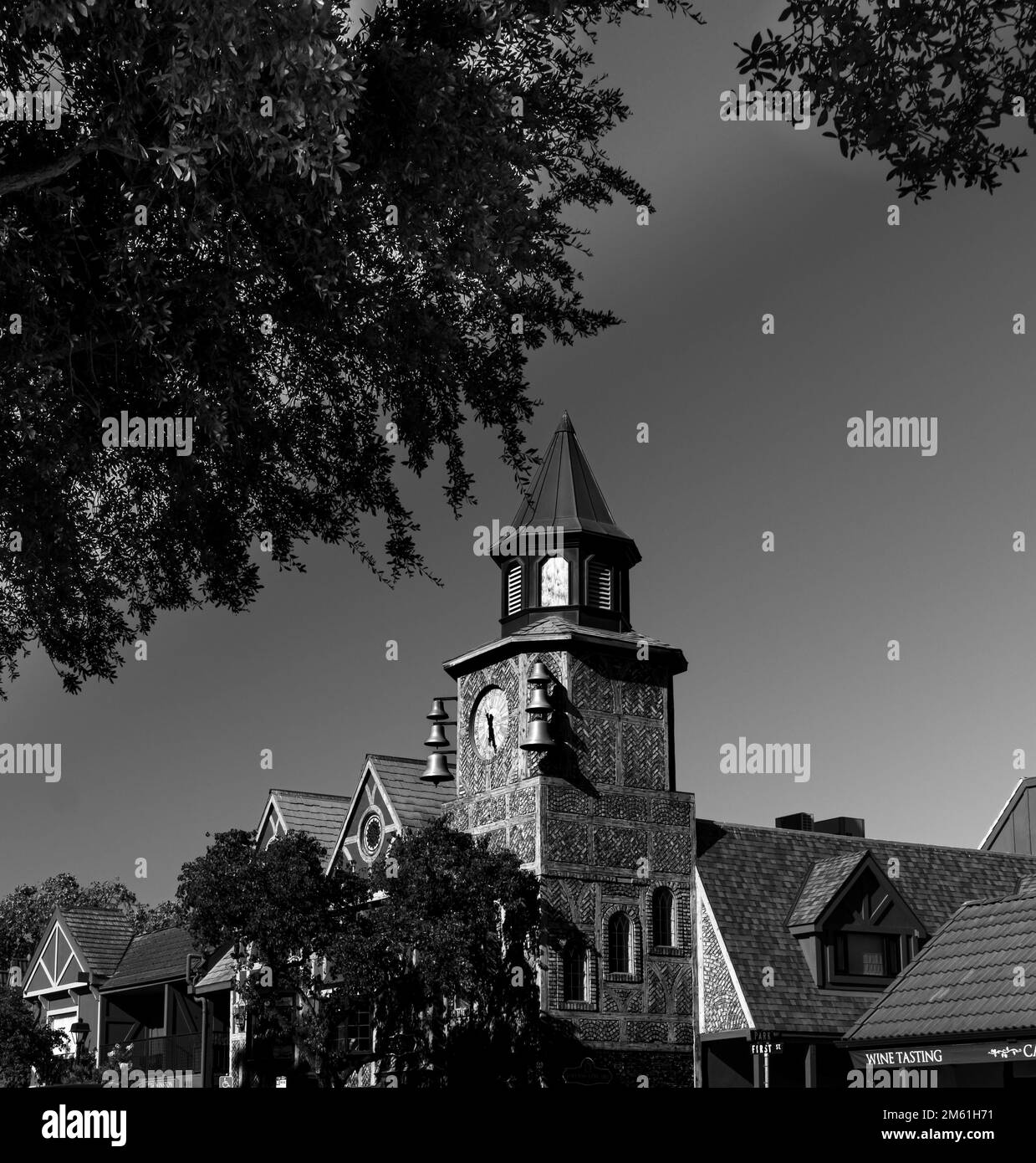 A grayscale shot of an old mill clock tower in Solvang, California ...