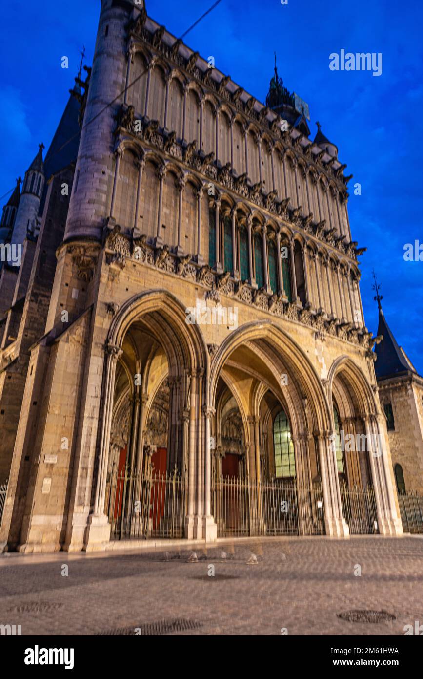 Side view of Paroissie Notre Dame Cathedral in Dijon, France at night ...
