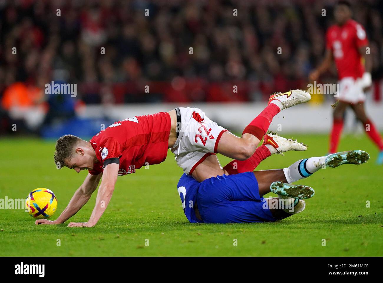 Nottingham Forest's Ryan Yates (top) and Chelsea's Denis Zakaria go ...