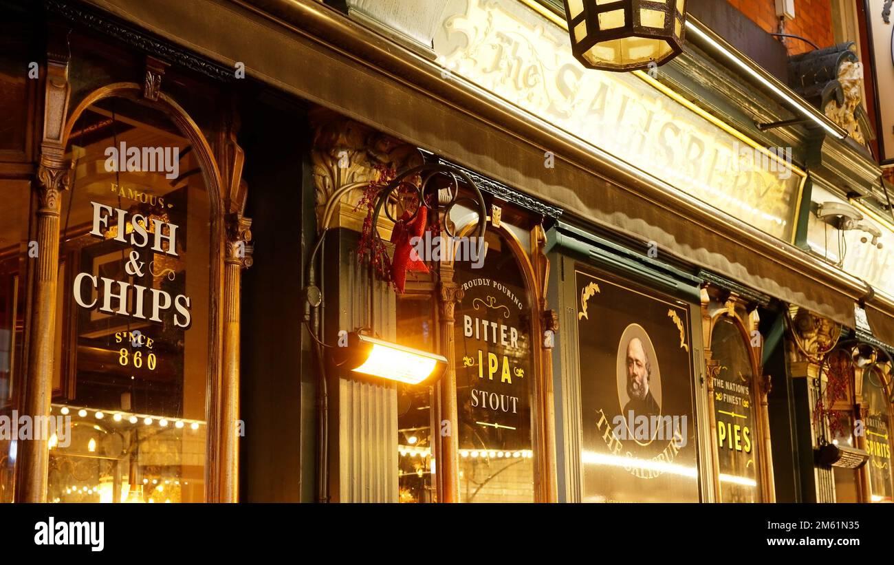 Salisbury Pub in London at night - LONDON, UK - DECEMBER 20, 2022 Stock ...