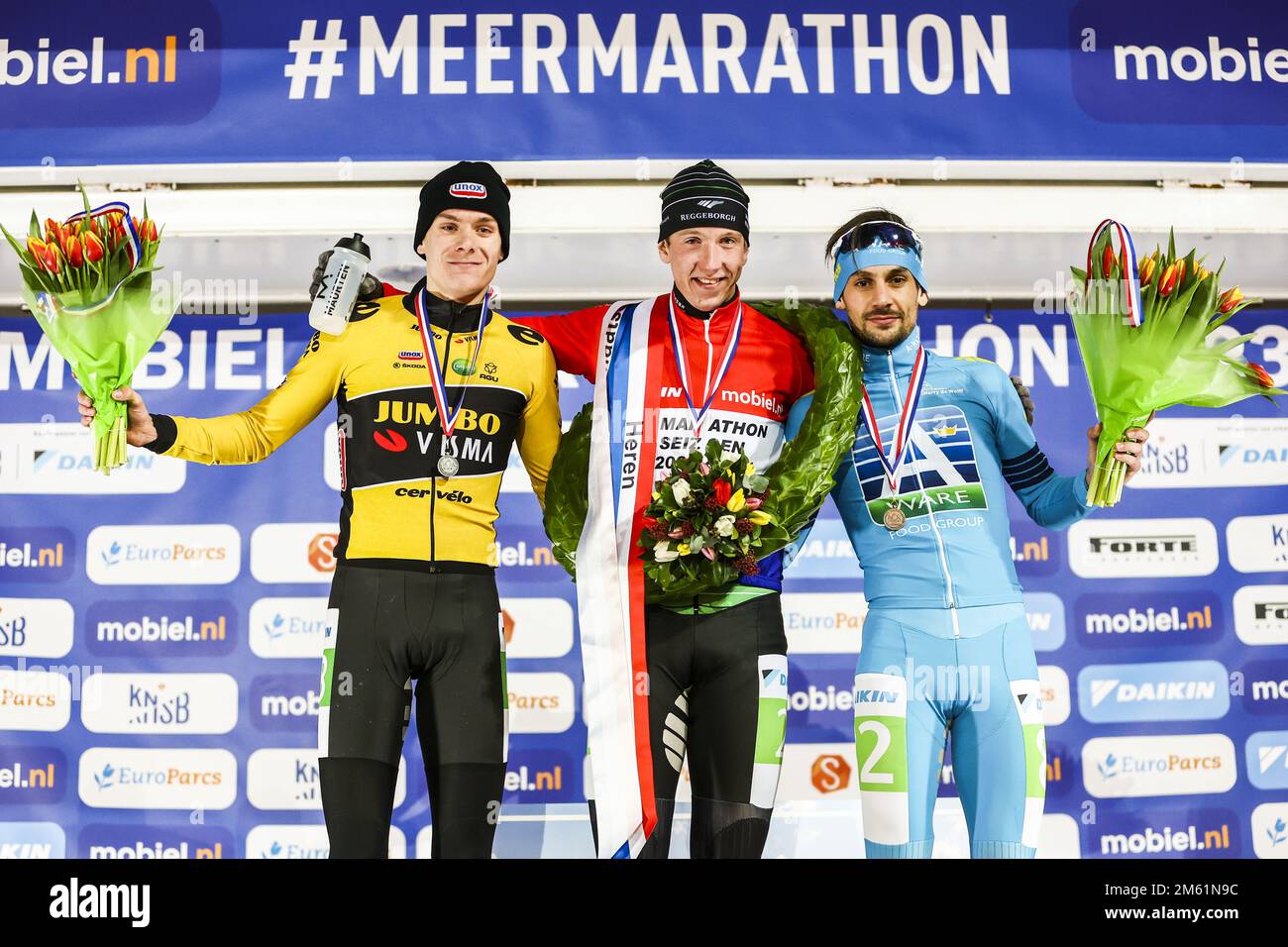 AMSTERDAM - Winner Evert Hoolwerf amidst Robert Post (L) (second) and ...