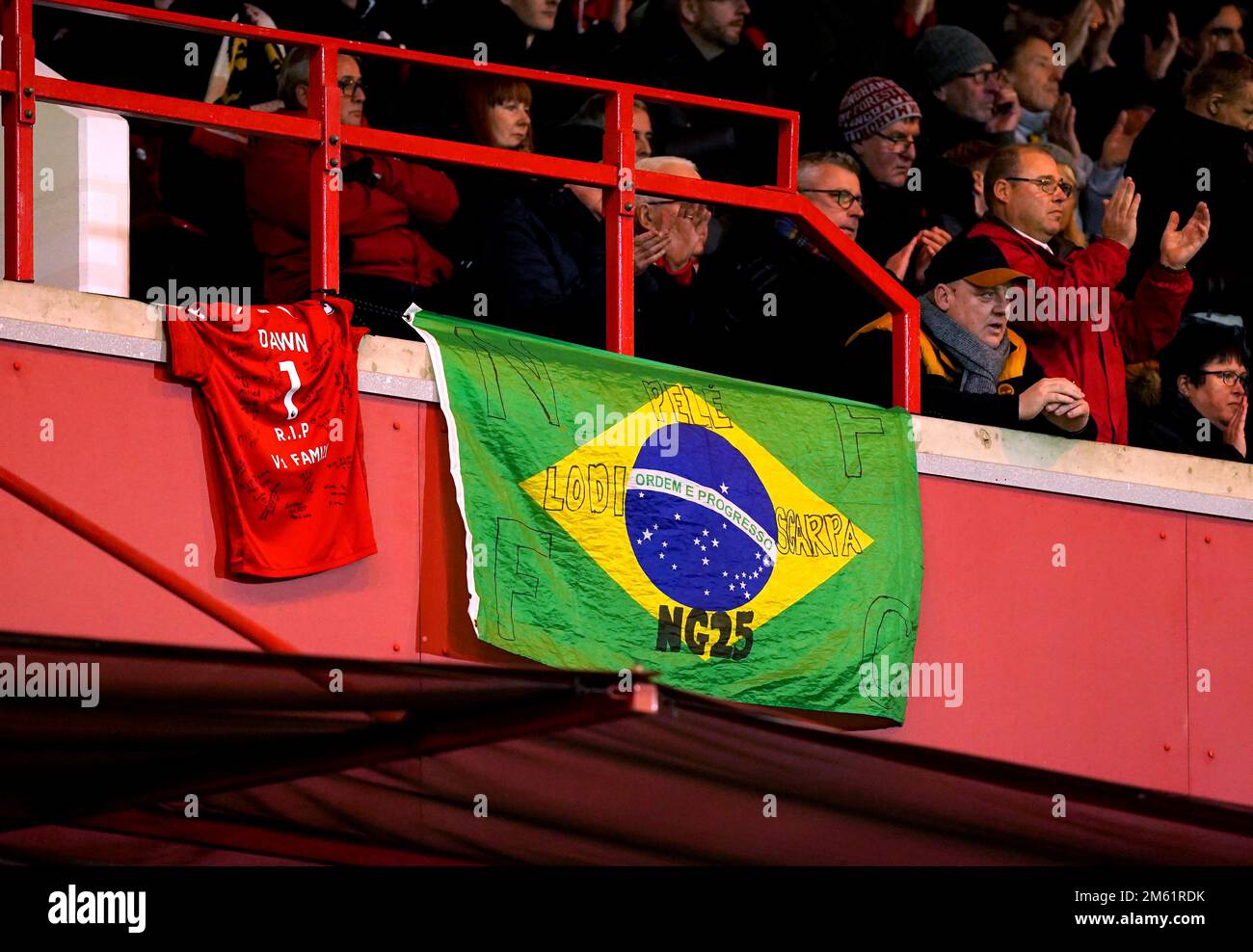 A Brazil flag hangs in the stands with the names of former Brazil ...