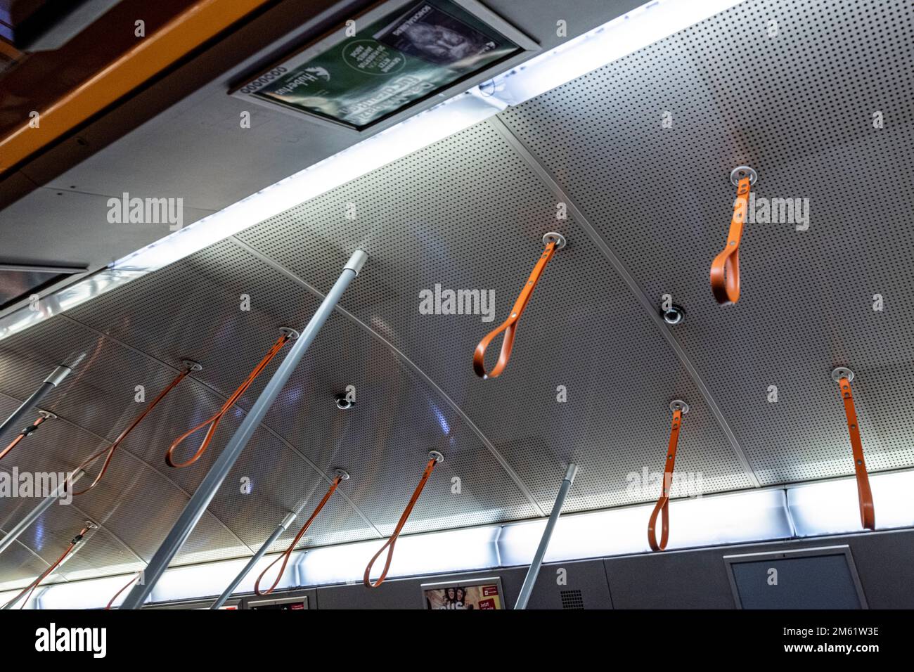 Straps for hanging on travelling in tube carriage, Vienna Stock Photo ...