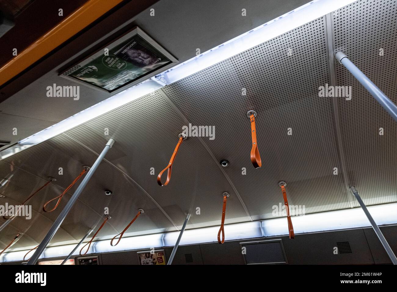 Straps for hanging on travelling in tube carriage, Vienna Stock Photo ...
