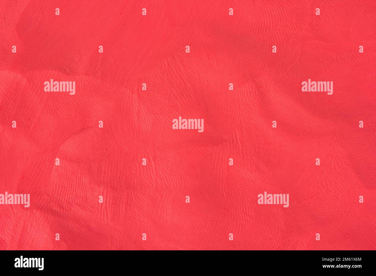 red Plasticine textured background Stock Photo - Alamy