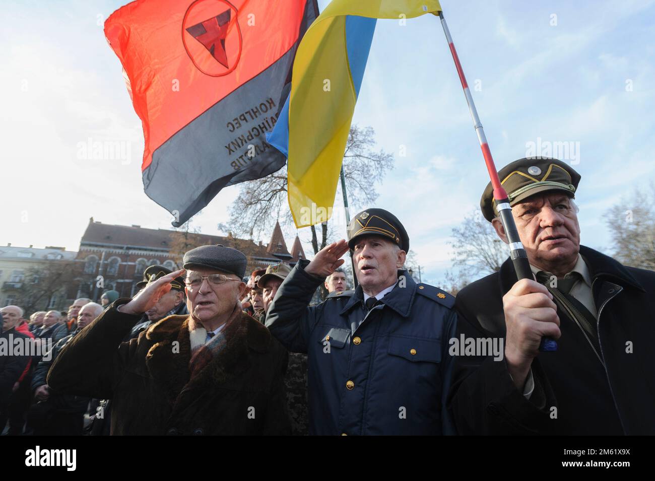 People wearing uniforms of the Ukrainian Insurgent Army and holding ...