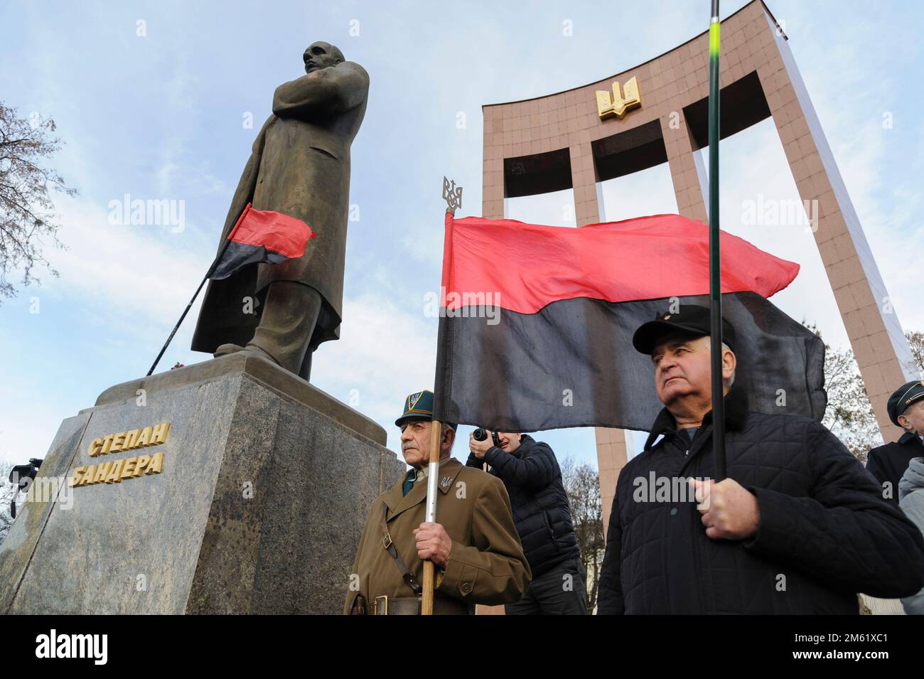 People wearing uniforms of the Ukrainian Insurgent Army and holding ...