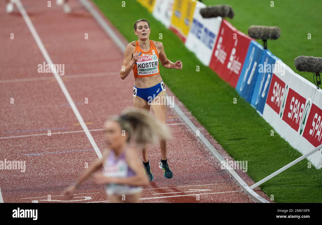 Maureen Koster reaching the finish line in the 5000 meters at the ...